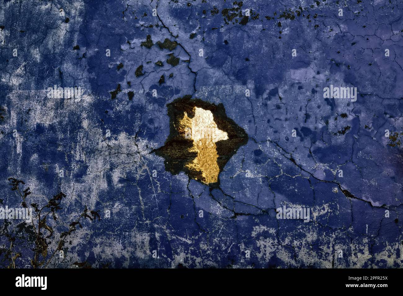 An abandoned house in the East. The wall is broken and a neglected ...