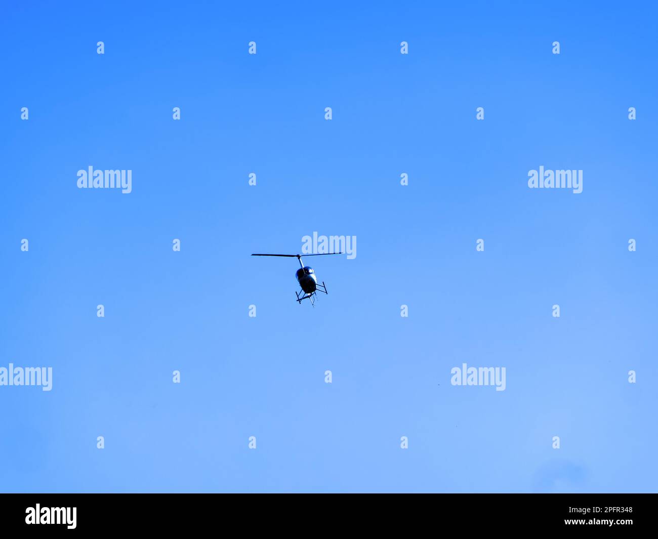 A light helicopter. Aerial evolutions Stock Photo - Alamy