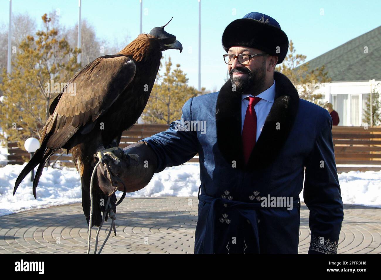 British Foreign Secretary James Cleverly poses for a photo with a ...
