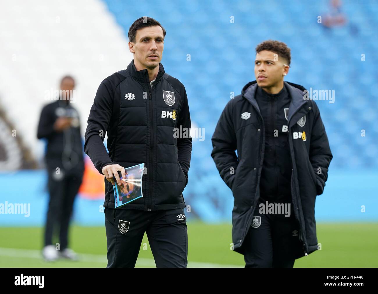 Burnley's Jack Cork (left) and Manuel Benson inspect the pitch before ...
