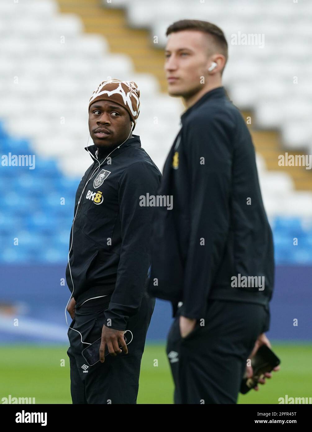 Burnley's Michael Obafemi (left) inspecting the pitch before the ...