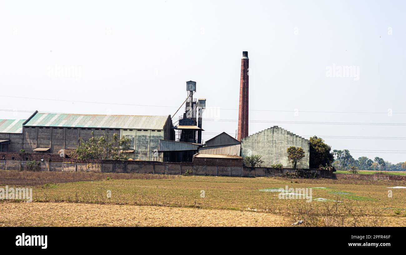 Industrial Factory Building landscape against clear sky background and ...