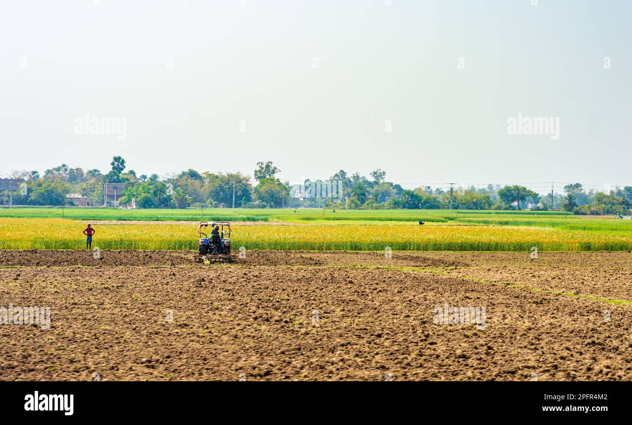 Agricultural field landscape view of rural india after harvest against ...