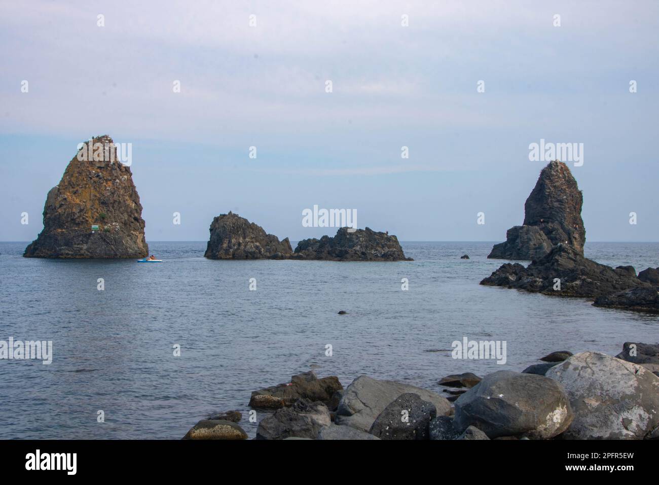 lavic rock formation off the coast of Aci Trezza in the so called ...