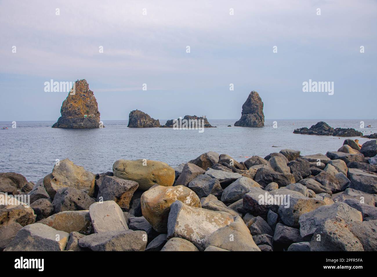 lavic rock formation off the coast of Aci Trezza in the so called ...