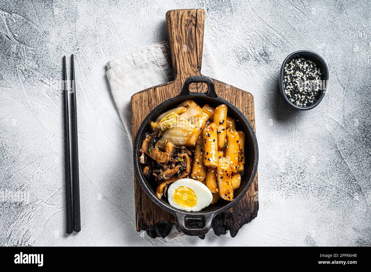 Tteokbokki, Topokki stick rice cake in spicy sauce with egg and ...