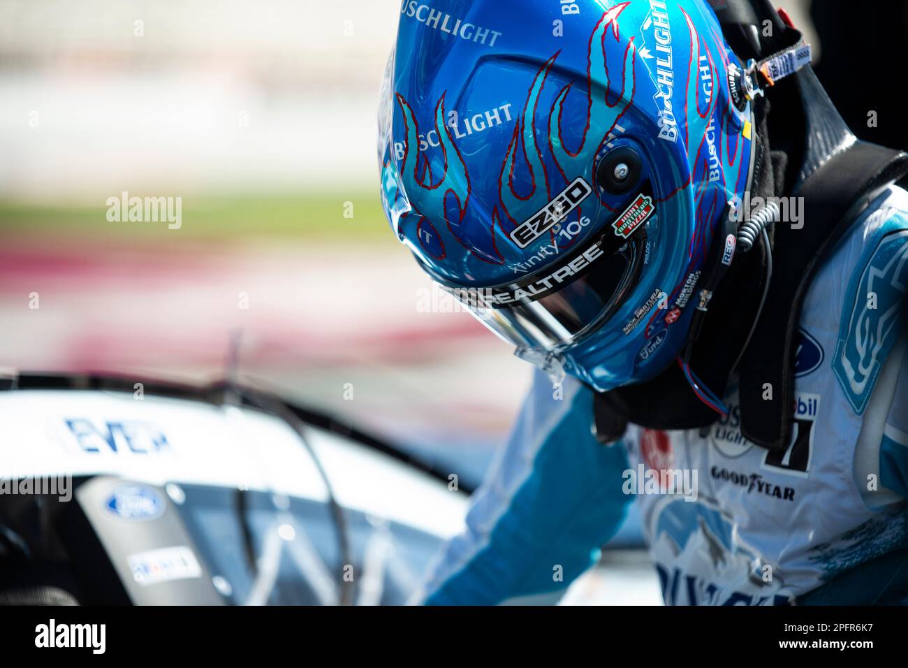 Kevin Harvick climbs into his car before qualifying for the NASCAR Cup ...