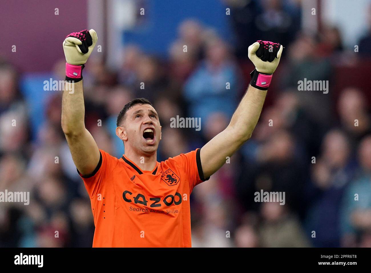 Aston Villa goalkeeper Emiliano Martinez celebrates their side's third ...