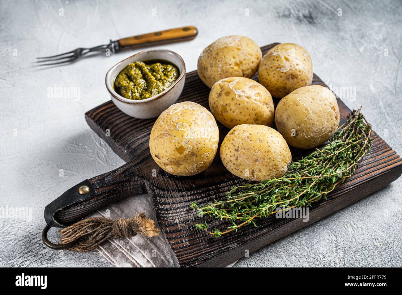 Canary Islands dish Papas Arrugadas, wrinkly potatoes with Mojo verde ...