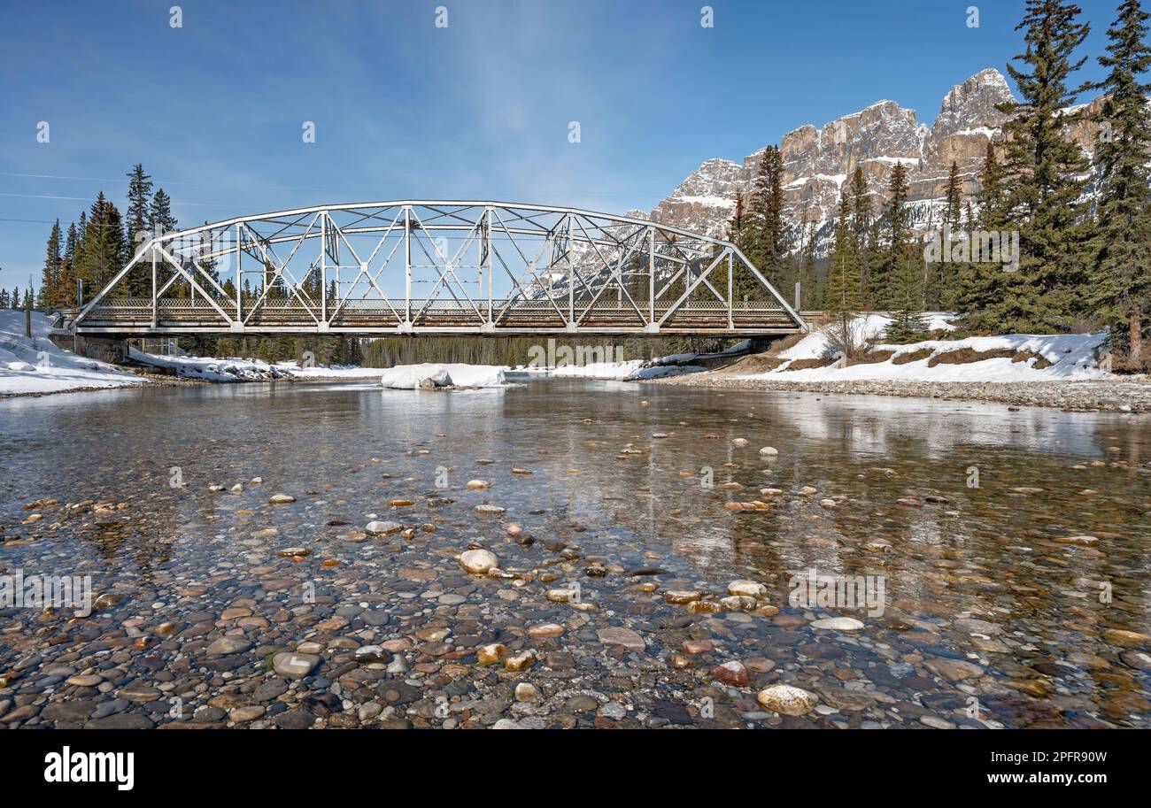 Old steel truss bridge over the Bow River at Castle Junction in Banff ...