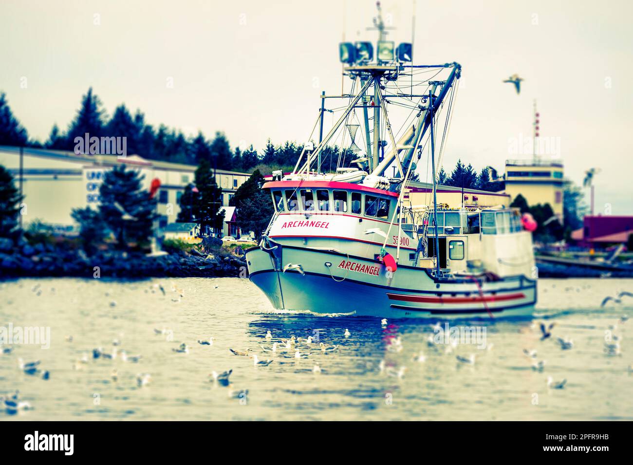 Commercial fishing vessel making way through the channel in Sitka ...