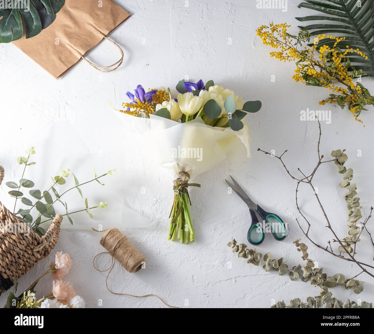 Make bouquet florist workplace. Flower arrangement in a flower shop ...