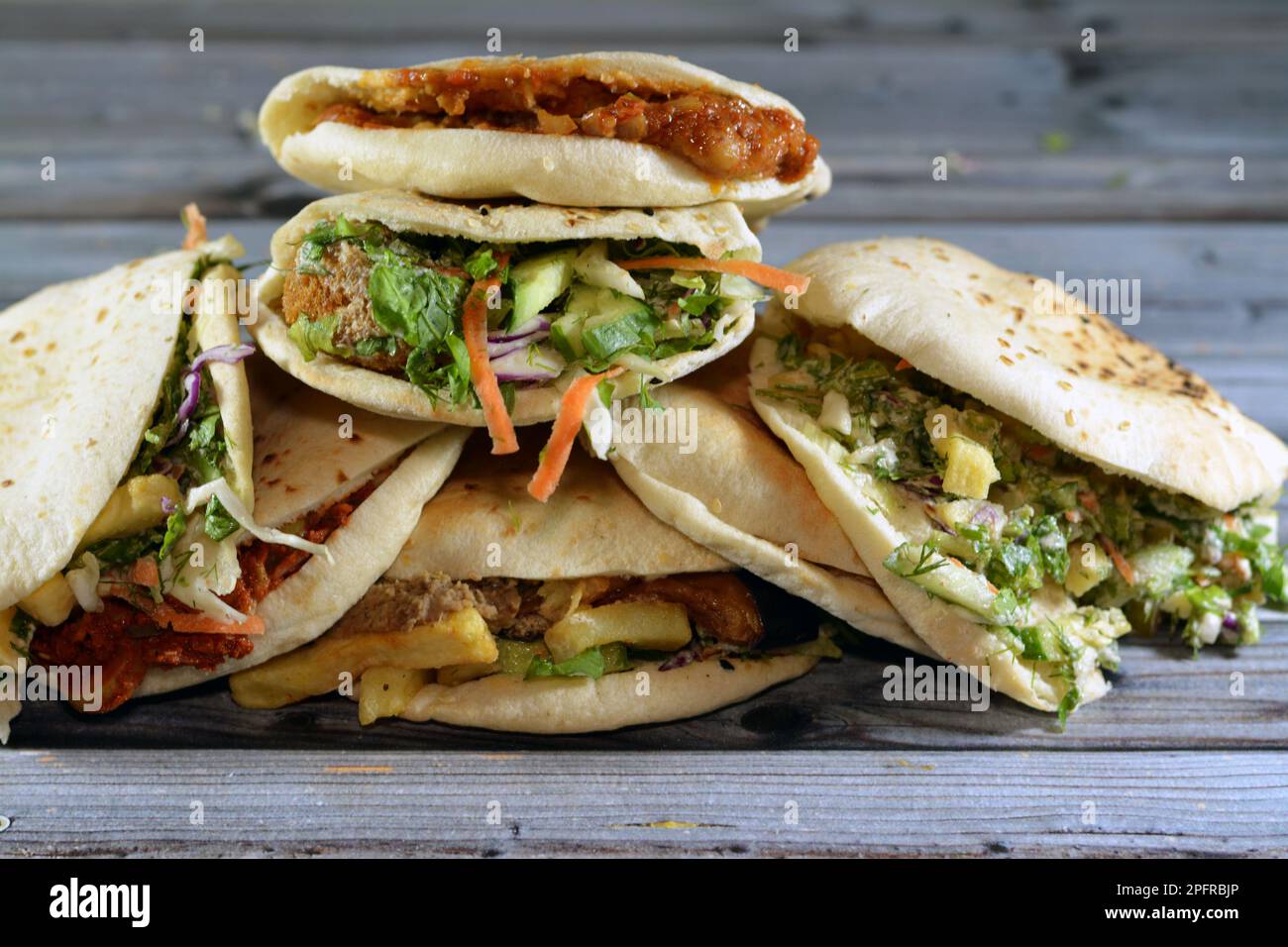 Traditional Egyptian popular breakfast street sandwiches of mashed fava ...