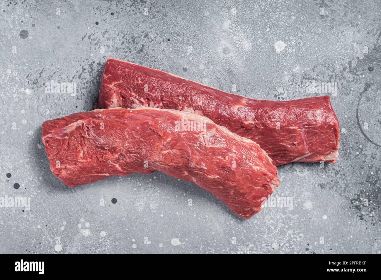 Raw lamb tenderloin Fillet, Mutton Sirloin Meat on butcher table. Gray ...