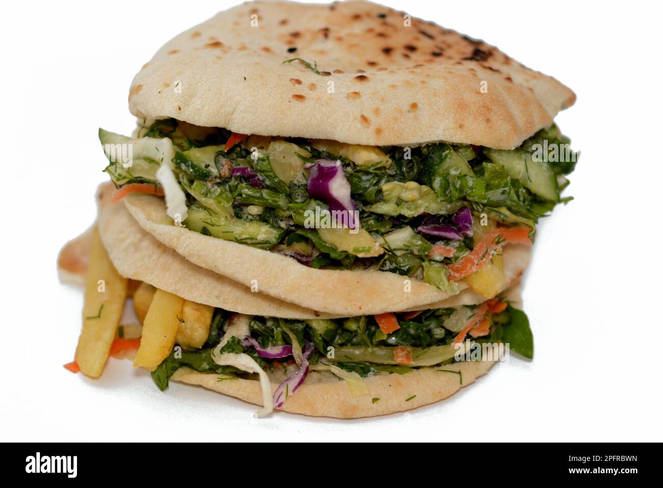 Flat Shami Syrian bread filled with french fries and green salad ...