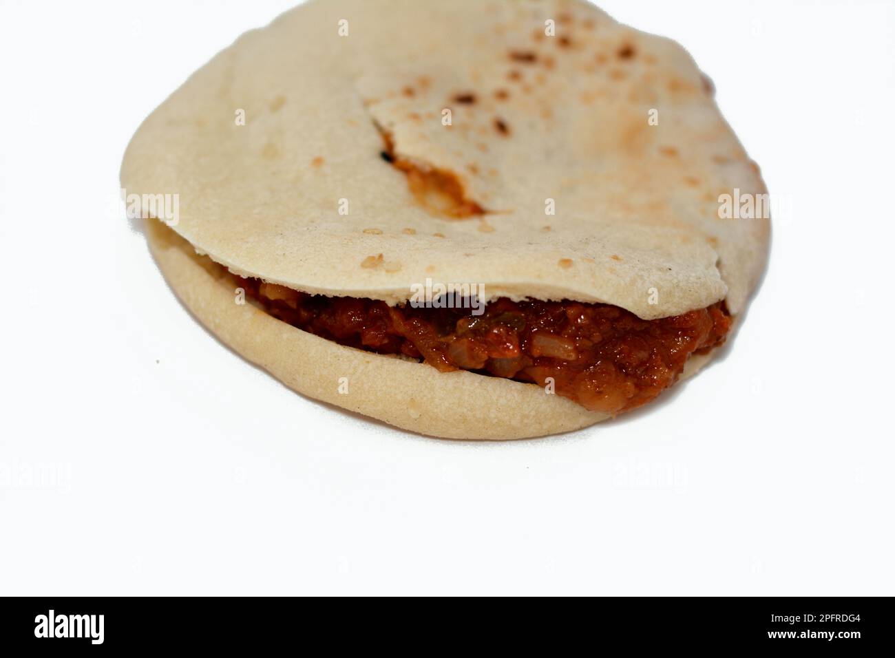 Shami Syrian pita bread with Moussaka which is an eggplant or potato ...