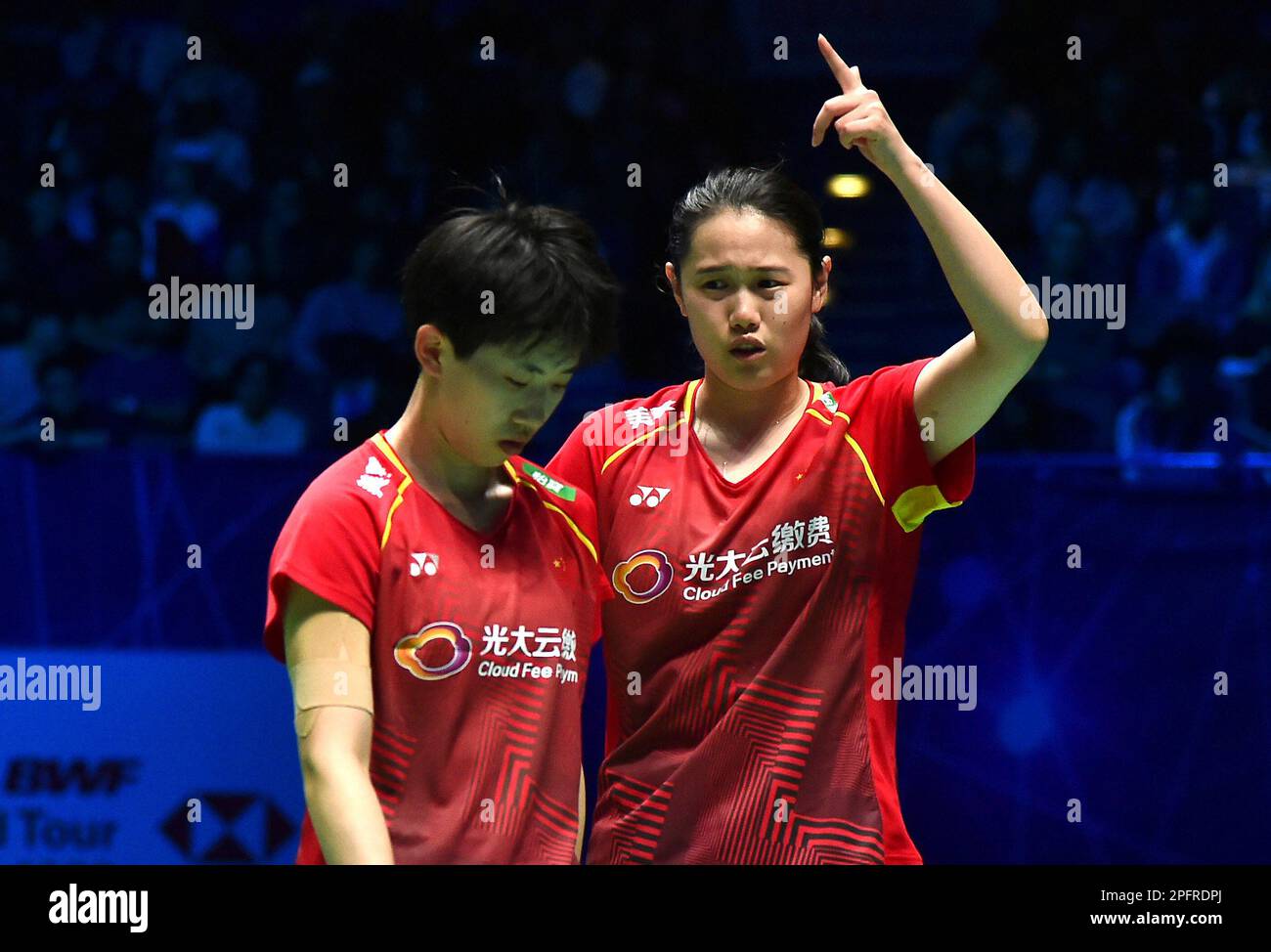 China's Zhang Shu Xian and Zheng Yu, right, react after losing a point during their women's ...