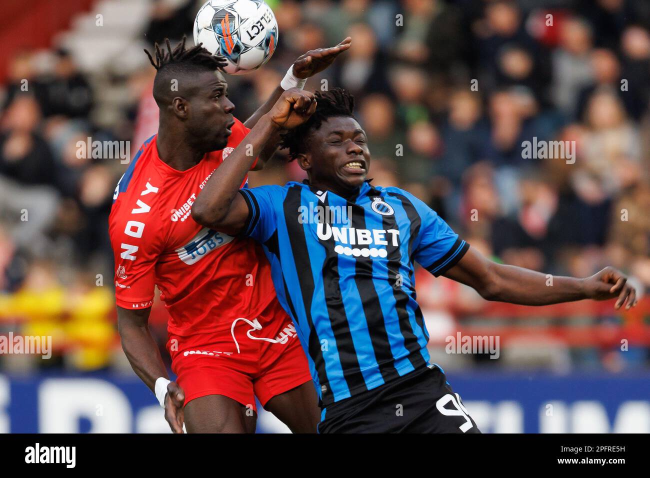 Kortrijk's Pape Habib Gueye and Club's Abakar Sylla fight for the ball during a soccer match ...