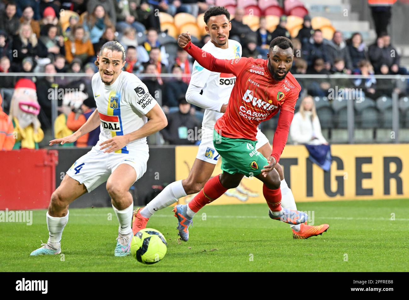 Westerlo's Mathias Fixelles and Oostende's Thierry Ambrose fight for ...