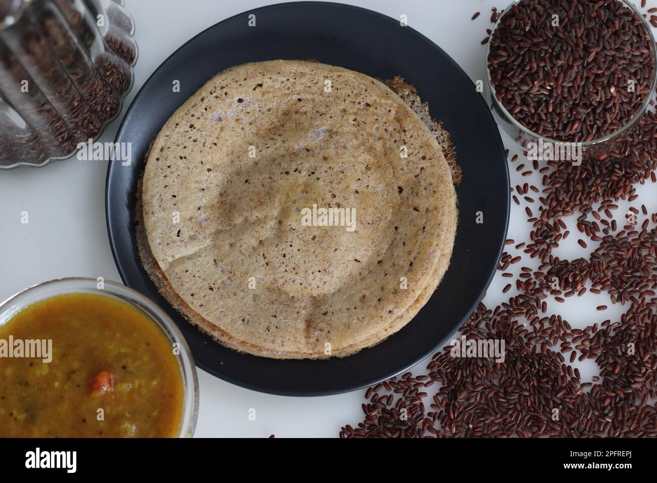 Soft spongy pancakes made of a fermented batter of poongar rice and ...