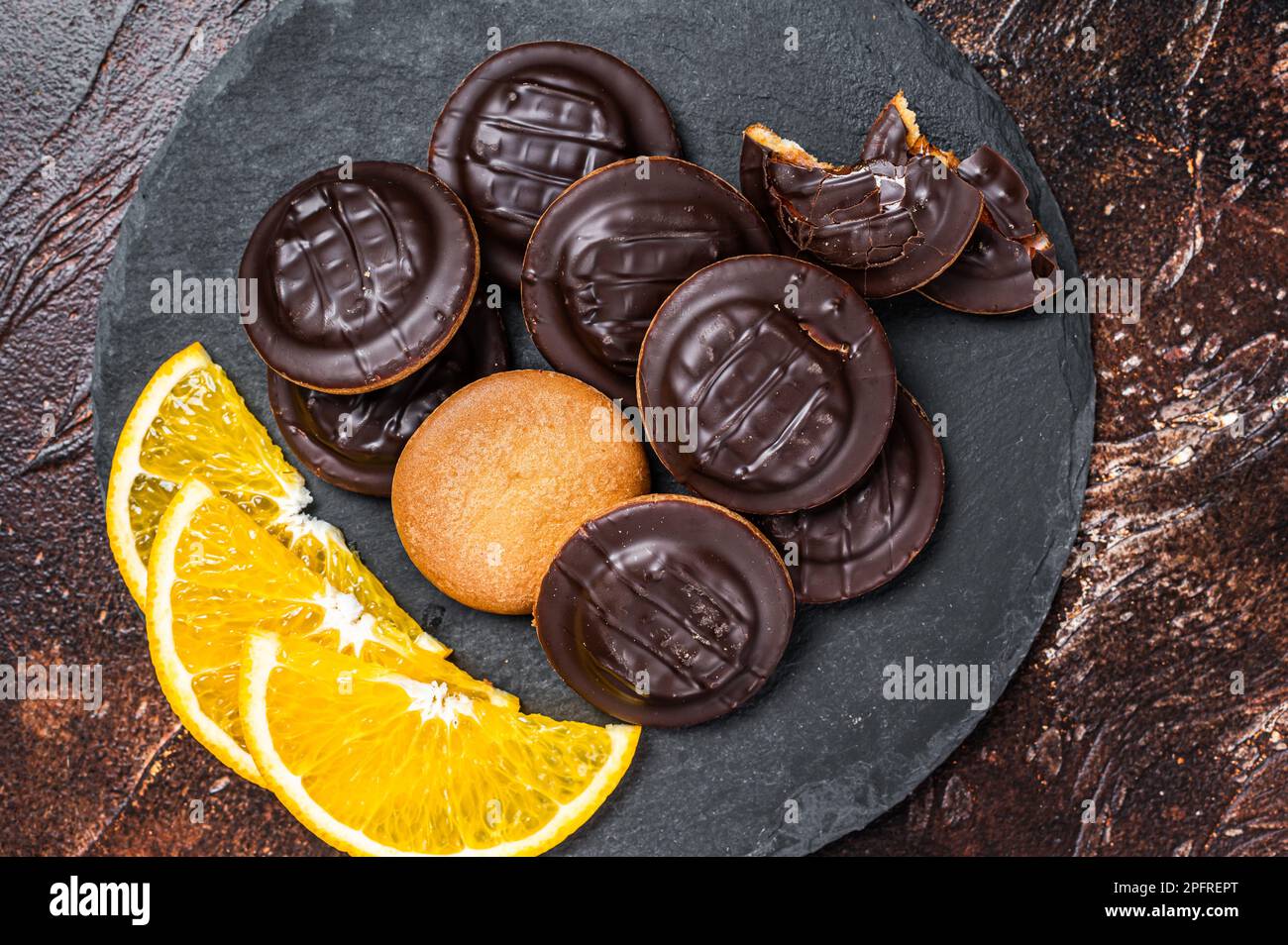 Stack of Chocolate Covered Round Jaffa Cookies with Orange Flavored ...