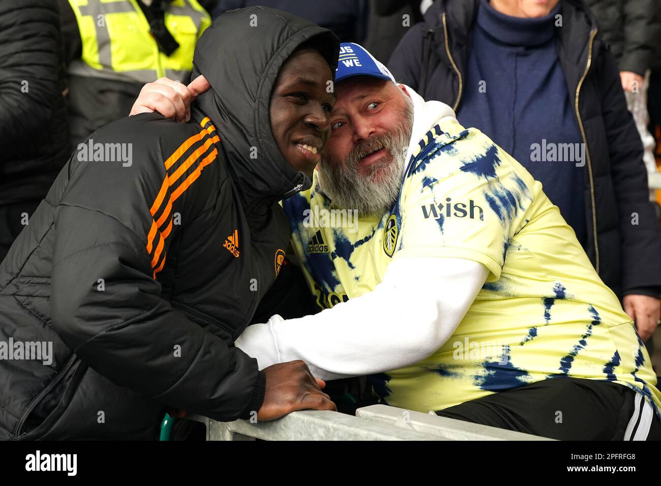 Leeds United's Wilfried Gnonto (left) poses for photographs with the ...