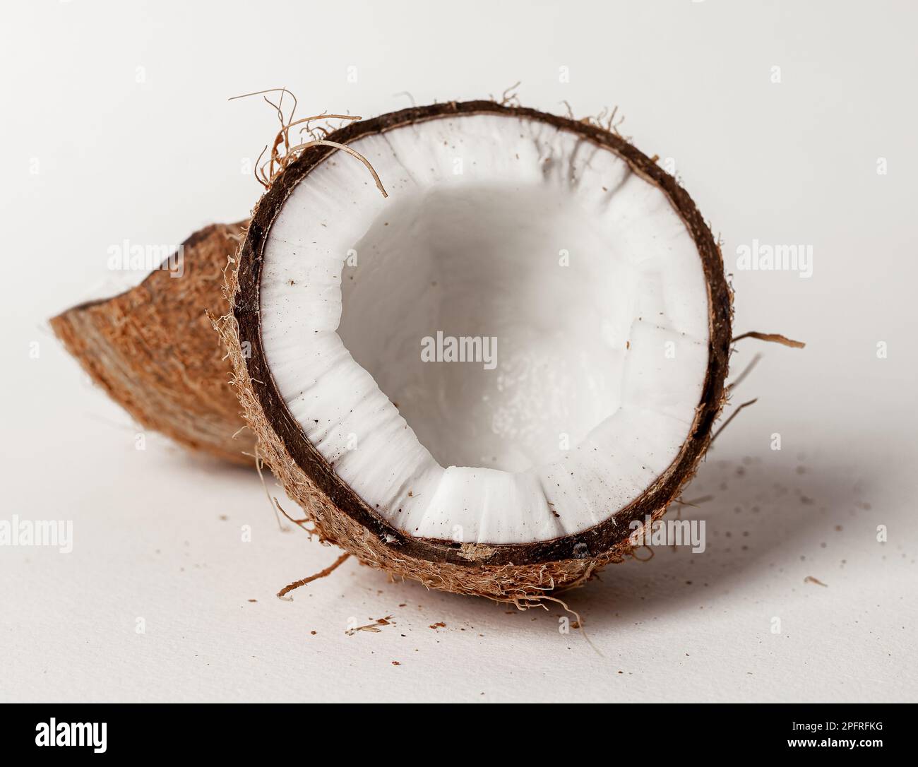 Exotic tropical coconut, coco nut fruit half Stock Photo - Alamy