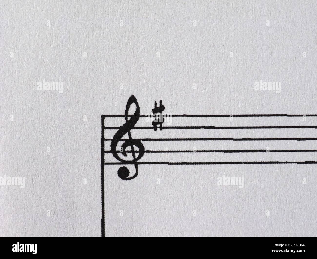 Treble clef and sharp on a music staff Stock Photo - Alamy
