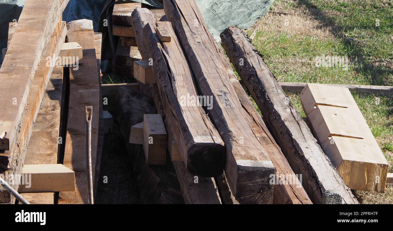 wooden logs and beams in a construction site Stock Photo - Alamy
