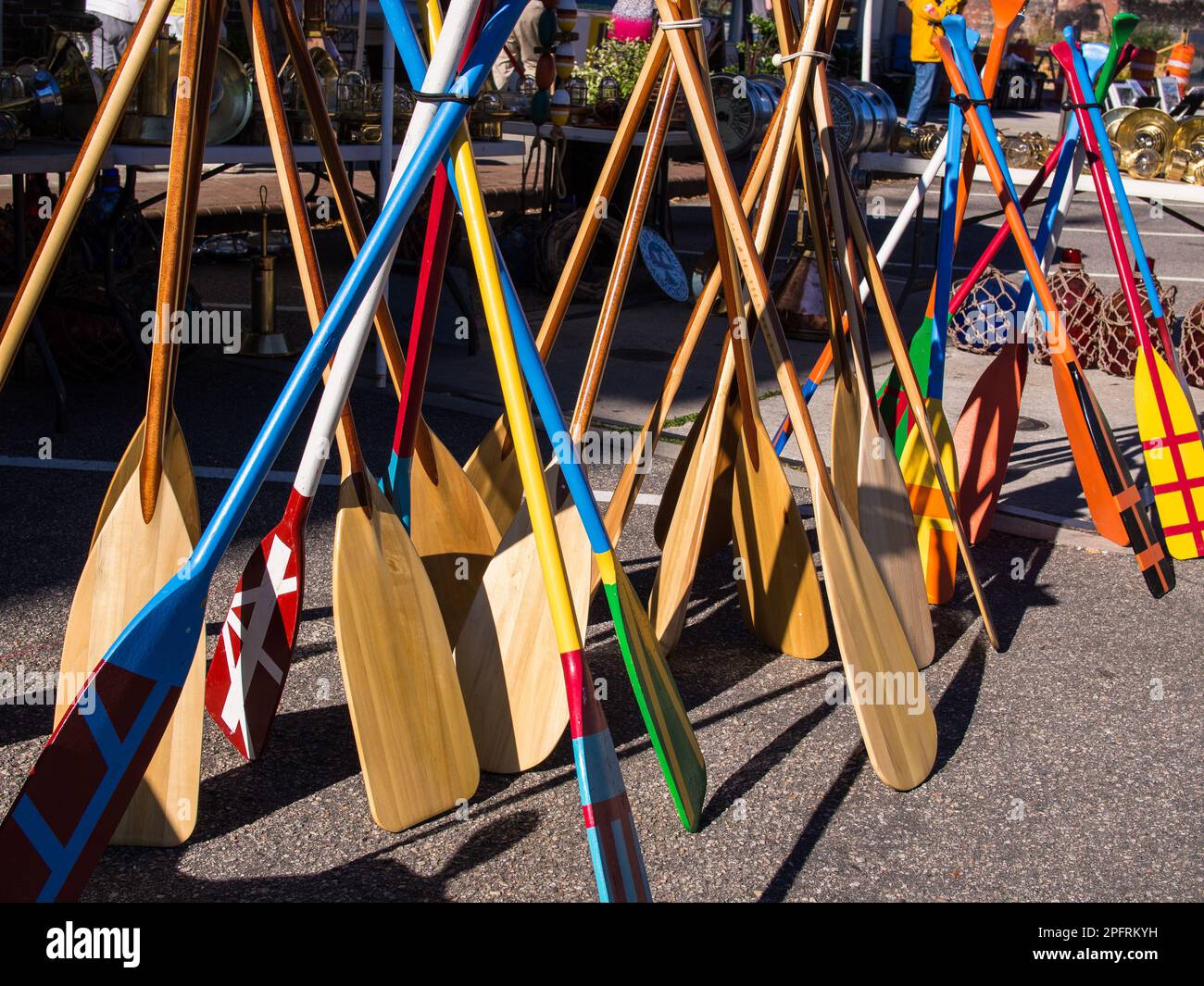 This photograph captures the vibrant display of handmade wooden boat ...