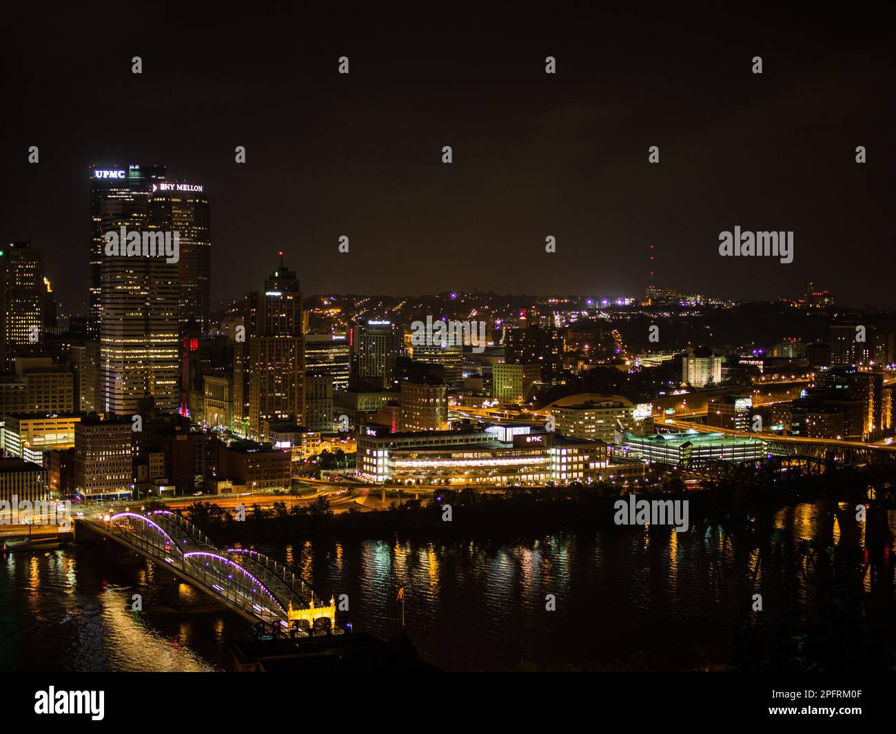 A breathtaking view of downtown Pittsburgh, Pennsylvania, at night, as ...