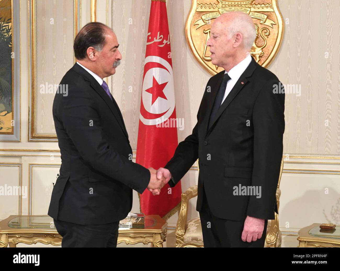In this photo released by the Tunisian Presidency, New Tunisian ...