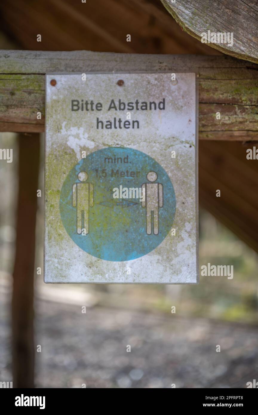 Keep distance of 1,5 meters german Corona Covid-19 Rule Sign with dirt ...