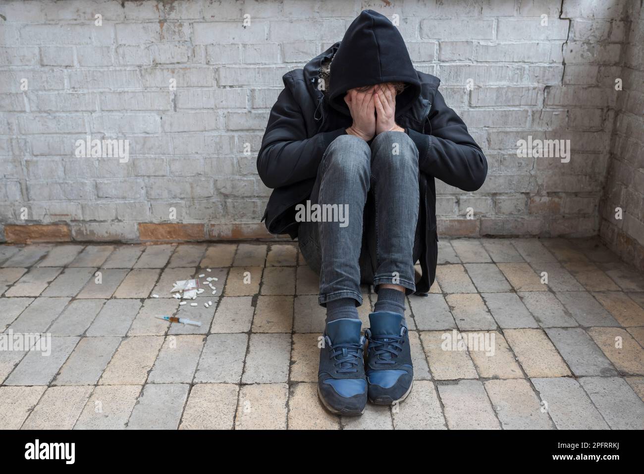 Addict and drugs in an abandoned house. International Drug Abuse Day ...