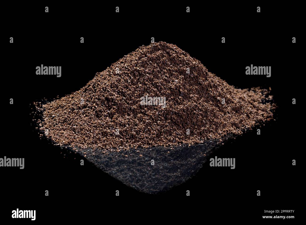 Ground coffee with reflection on the black isolated background Stock ...
