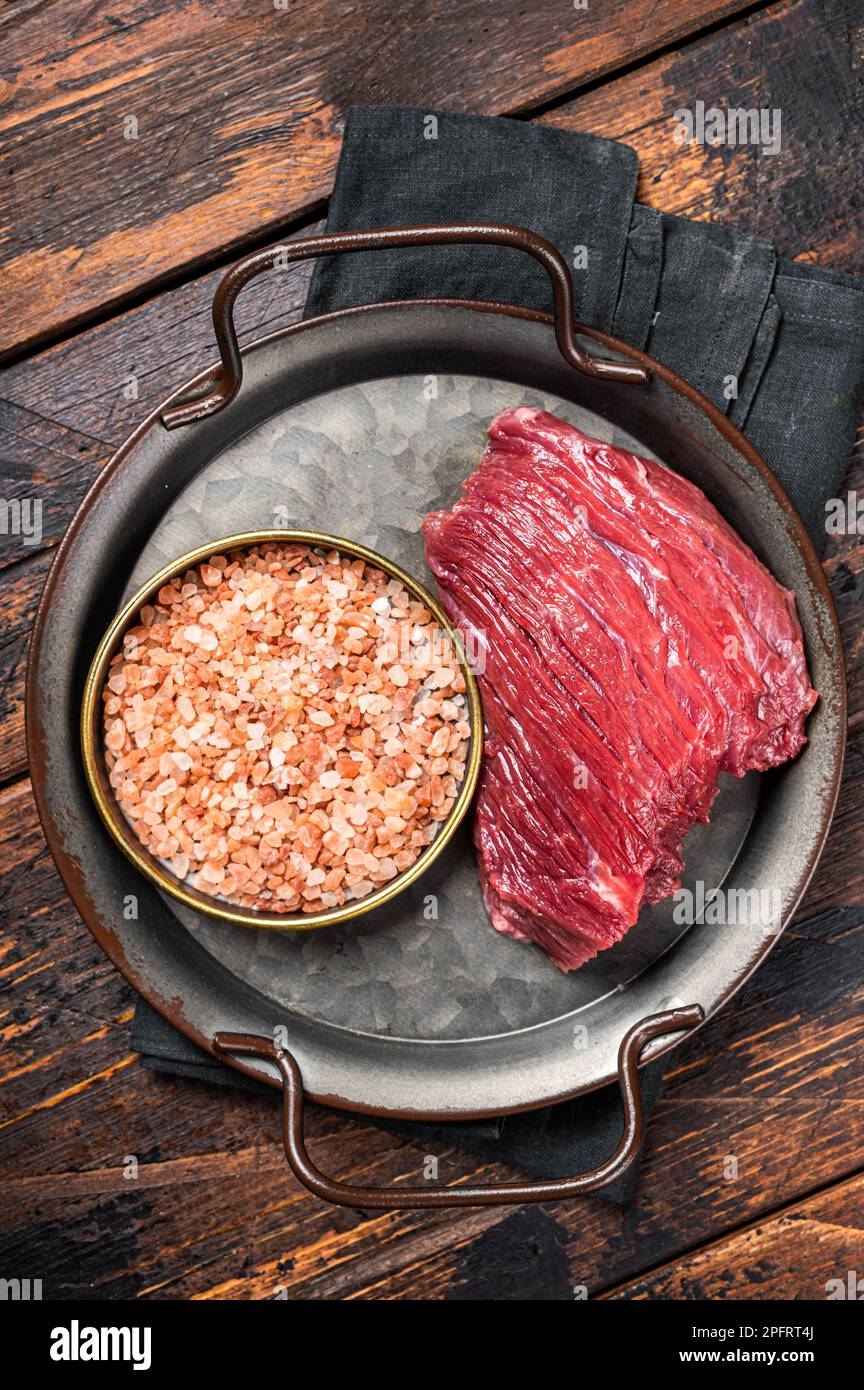 Raw Game meat of Venison dear, meat steak. Wooden background. Top view ...