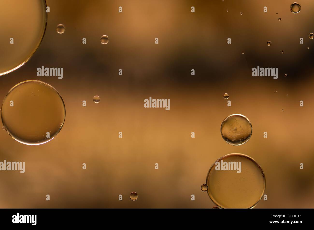 Abstract colorful bubbles. Soft background with gold and copper color ...
