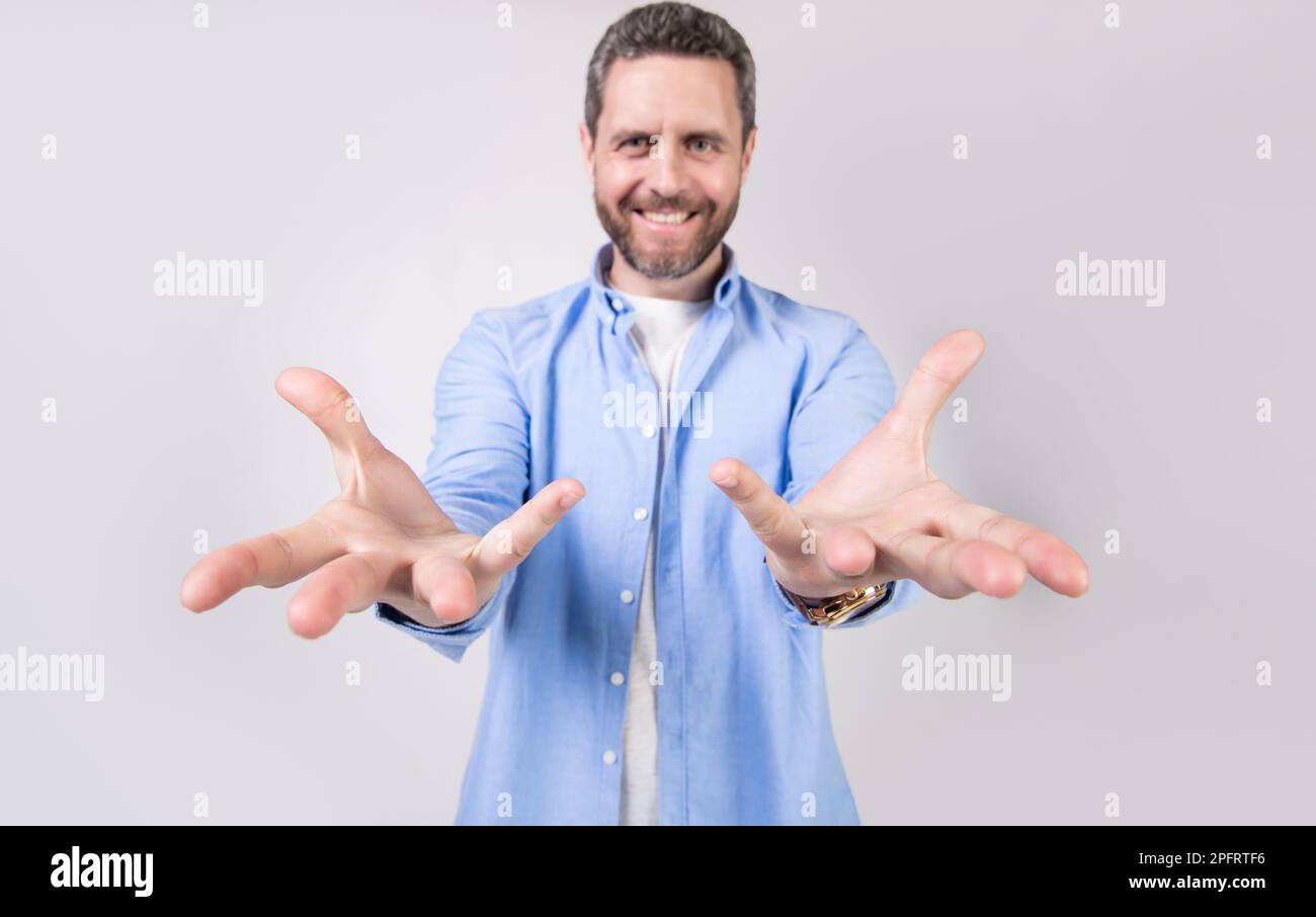 grabbing hands with grab gesture isolated on grey background. grabbing ...