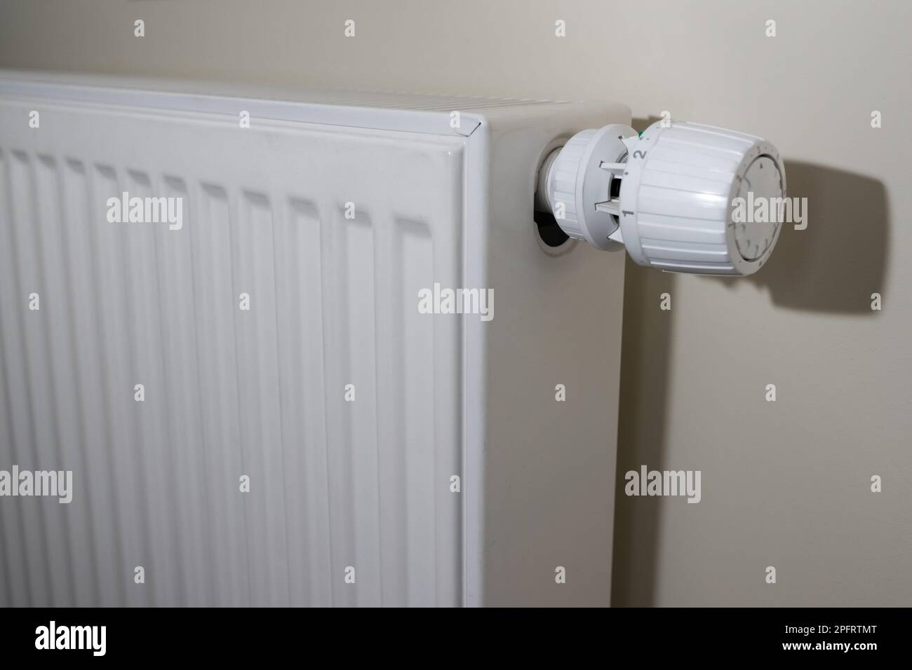 Heating Radiator, White radiator in an apartment Stock Photo - Alamy