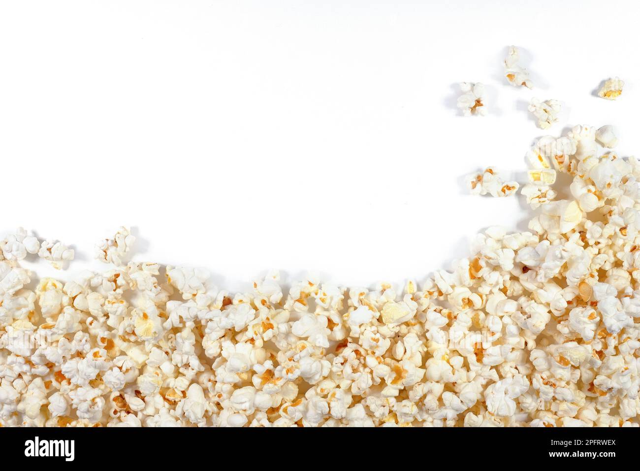 A pile of tasty popcorn, with copy space Isolated on white background ...