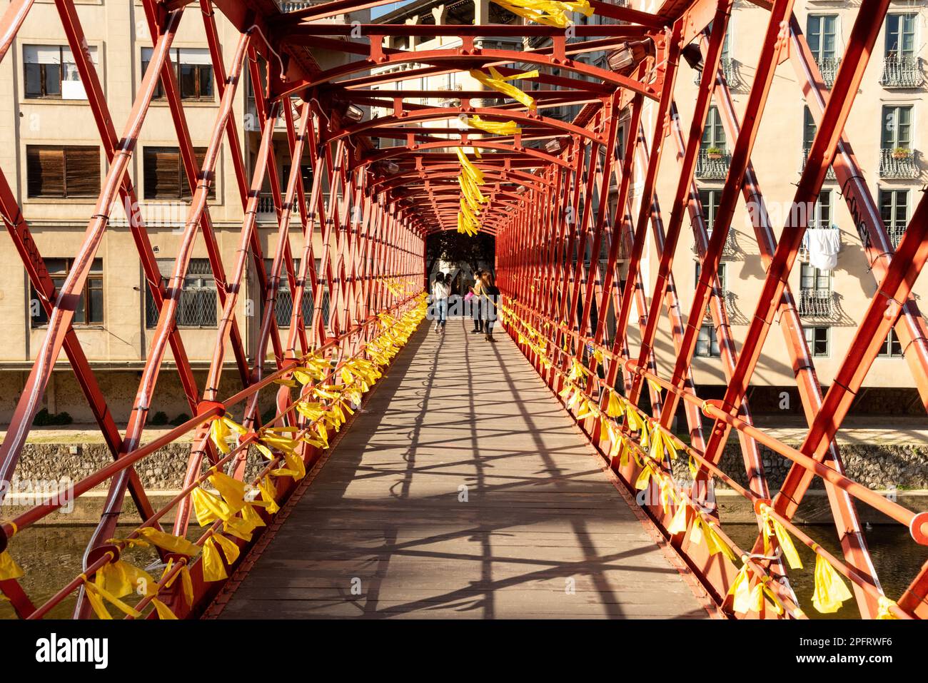 Girona's iconic red bridge, the Pont de les Peixateries Velles, adds a ...