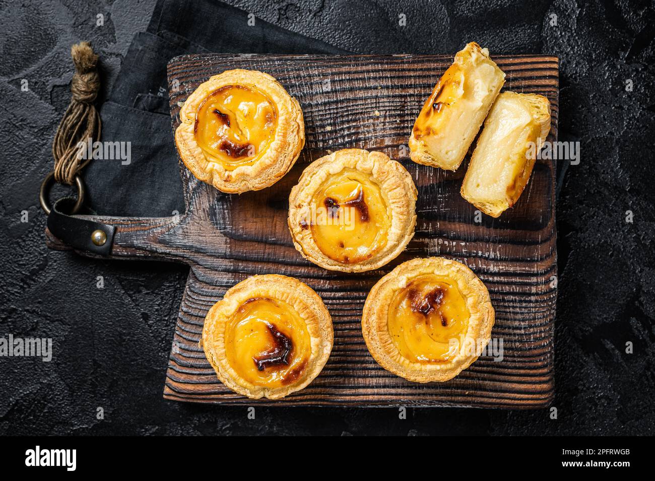 Custard Tarts Pasteis de Belem, Portuguese pastel de Nata. Black ...