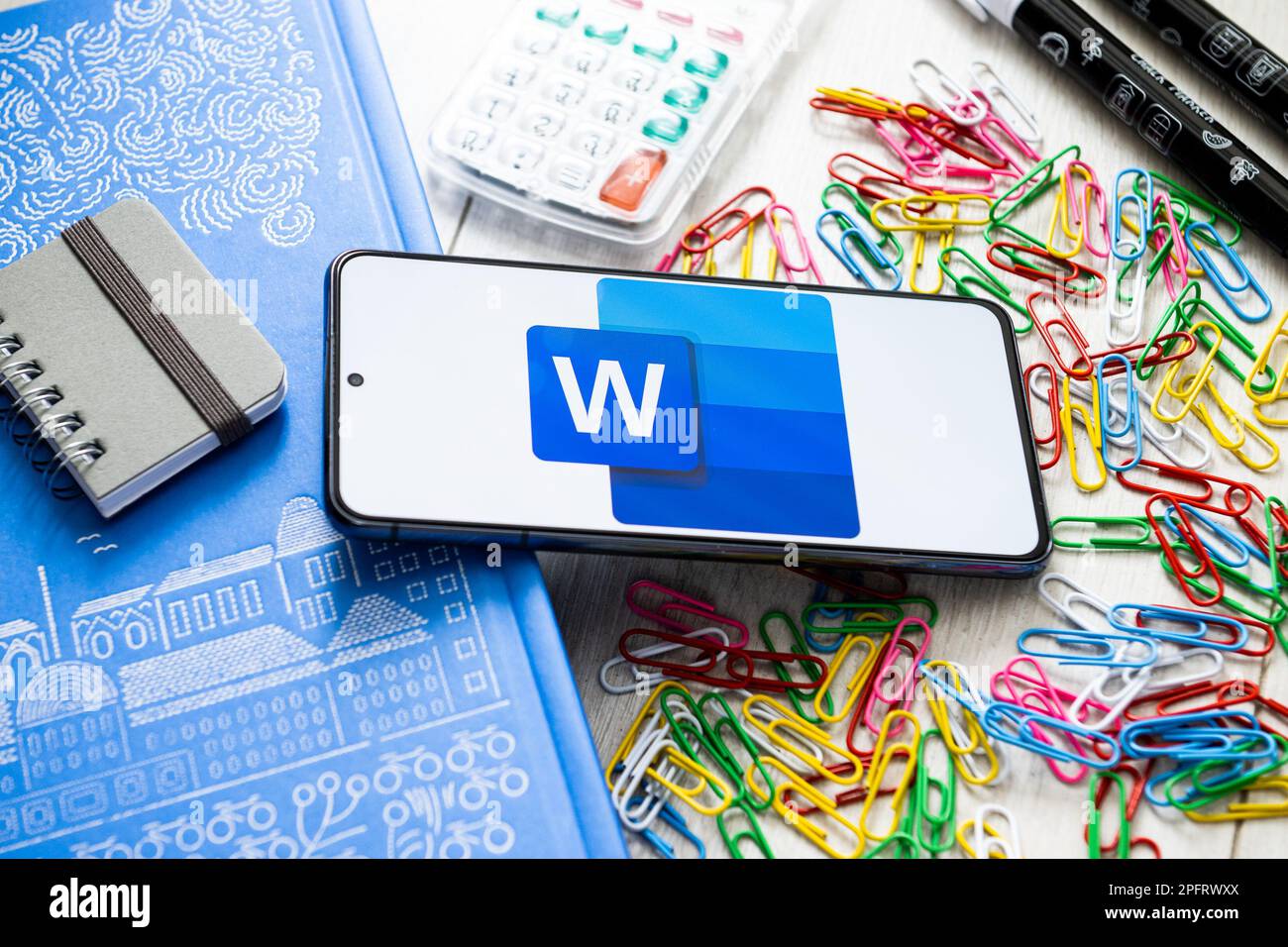 In this photo illustration a Microsoft Word logo seen displayed on a ...
