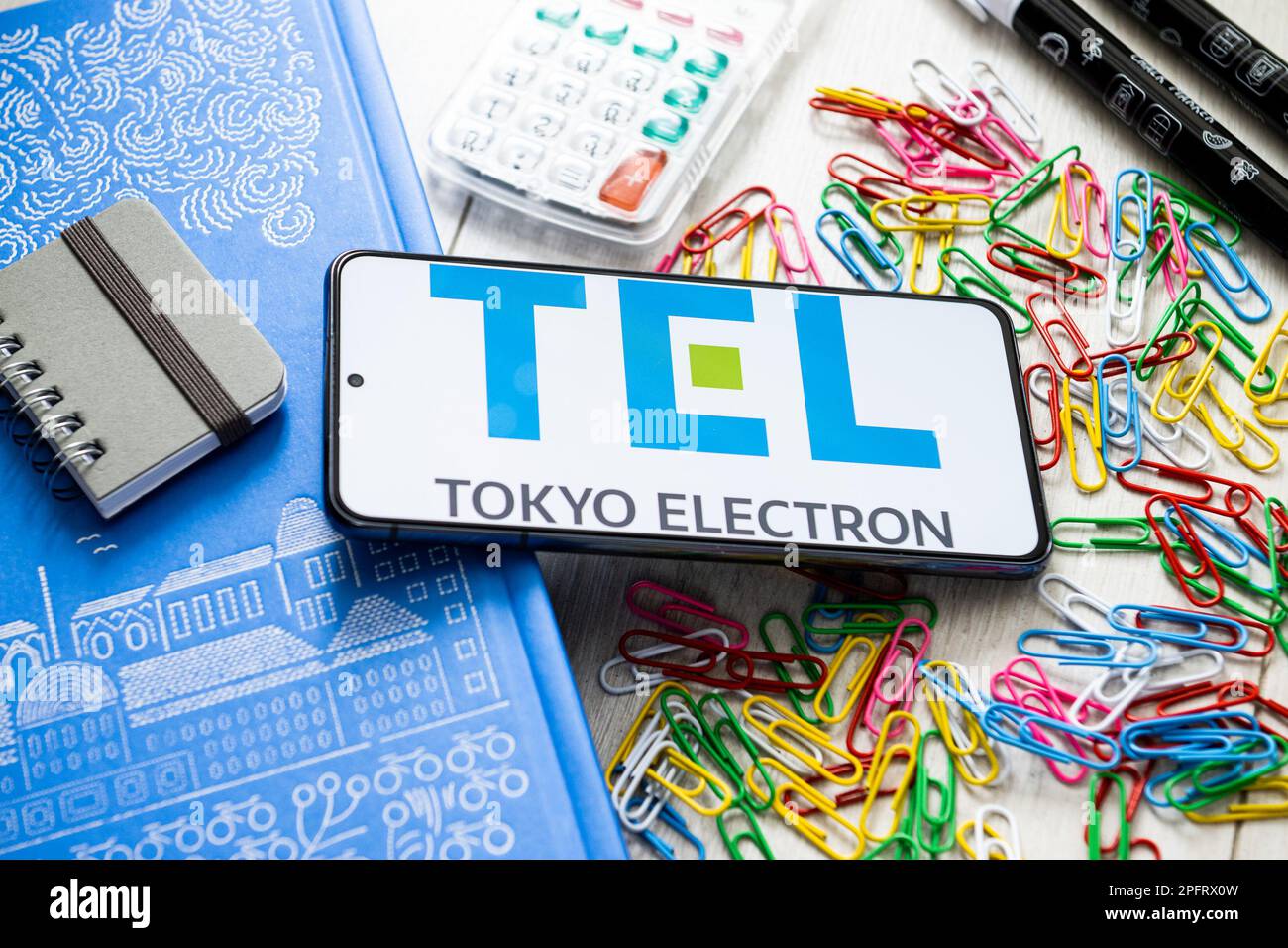 In this photo illustration a Tokyo Electron logo seen displayed on a ...