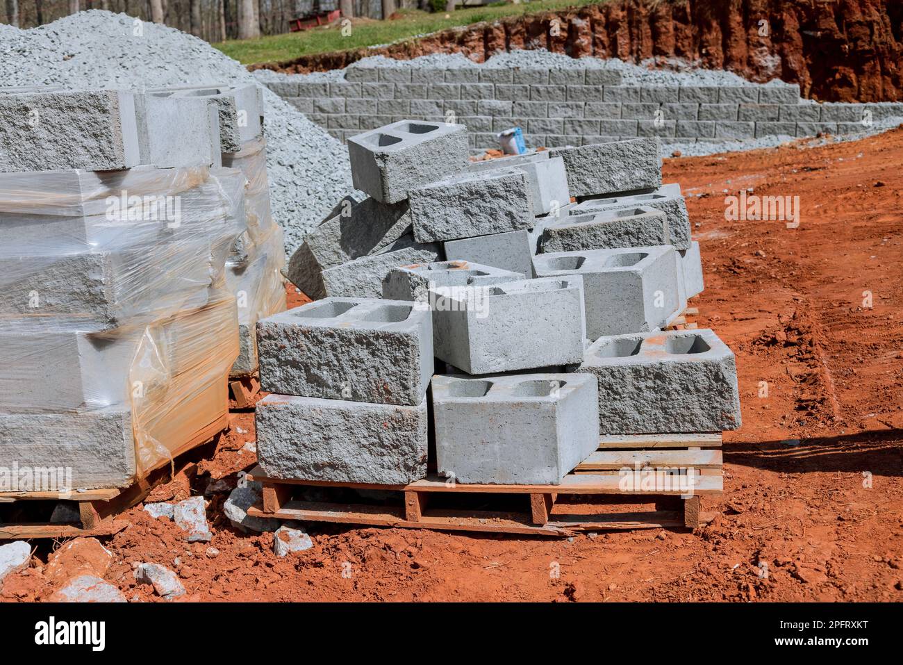 On newly constructed home there is retaining wall being built on ...
