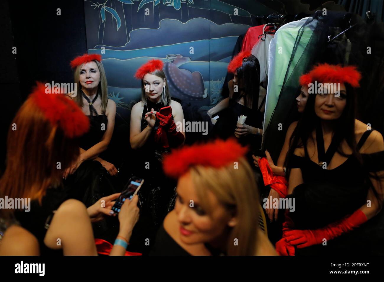 Models rest between shows backstage during the Volga Fashion Week in ...