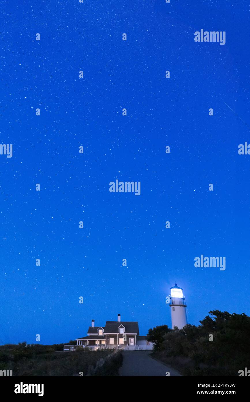 Highland Lighthouse under milky way in Cape Cod National Seashore ...