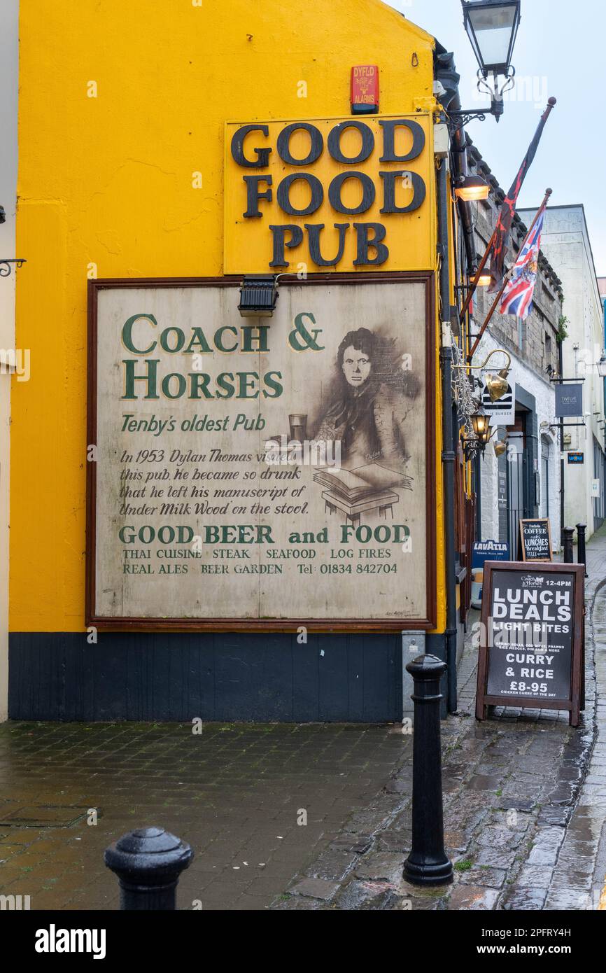 Sign on wall in Tenby stating Historic coach and horses pub where Dylan ...