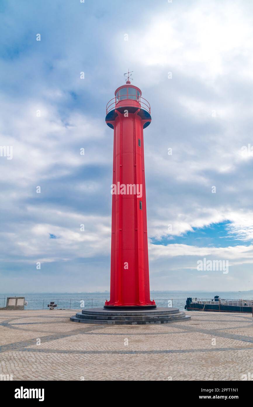 The Cacilhas Lighthouse (Portuguese: Farol de Cacilhas). Red lighthouse ...
