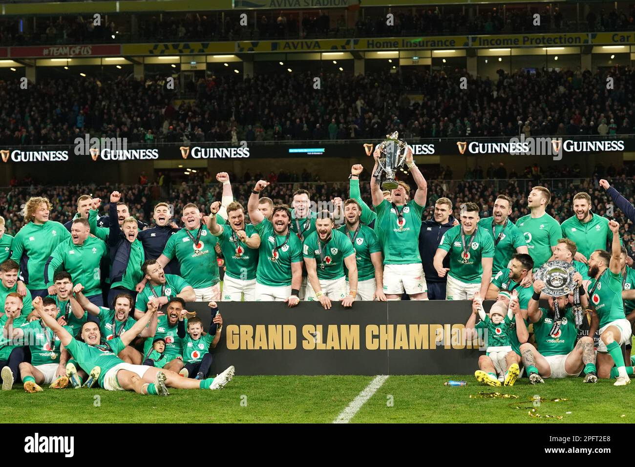 Ireland pose with the Six Nations and Grand Slam trophies after the ...